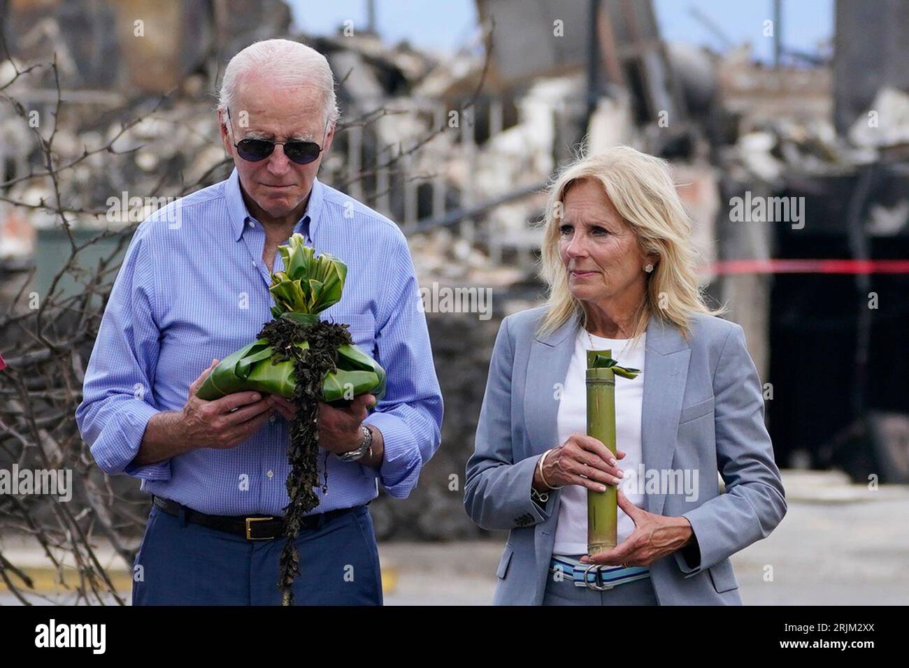 President Joe Biden and first lady Jill Biden participate in a blessing ...