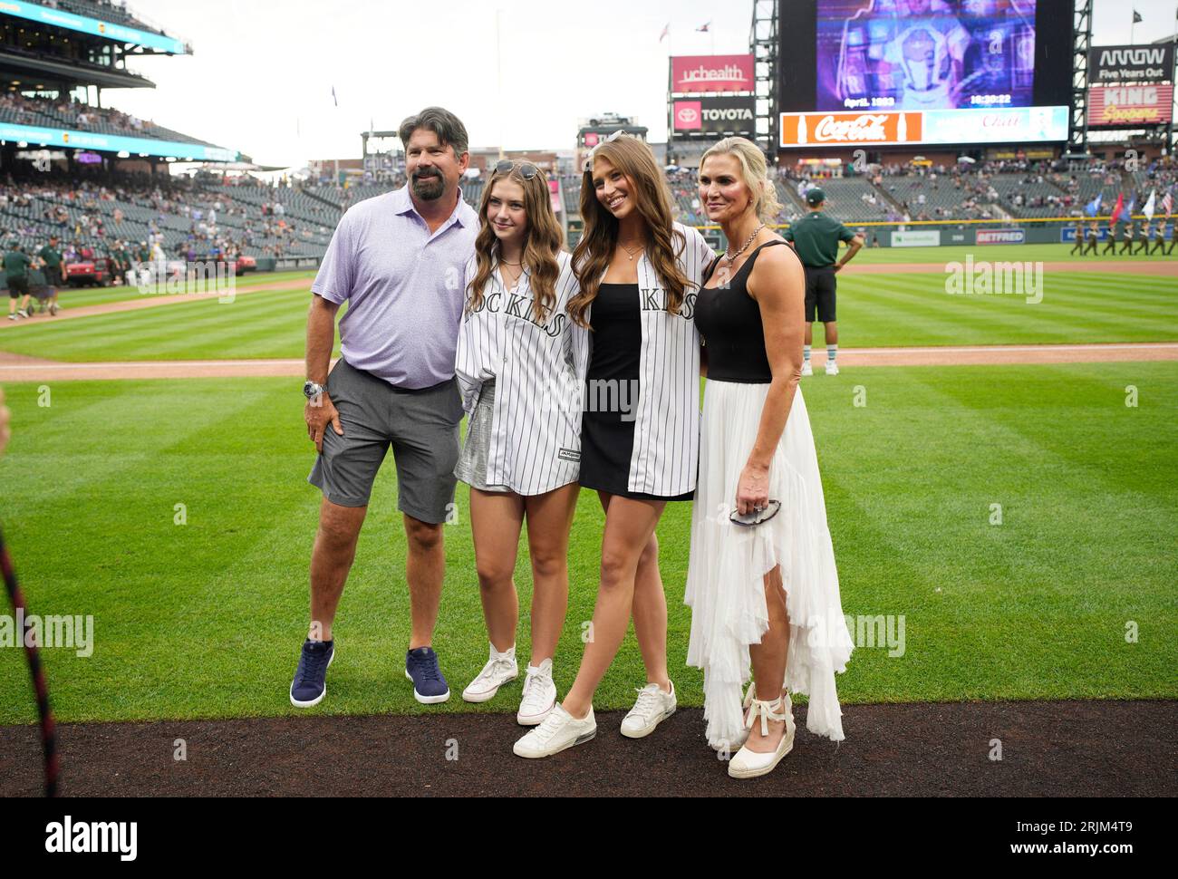 From left, retired Colorado Rockies first baseman Todd Helton, his 13 ...