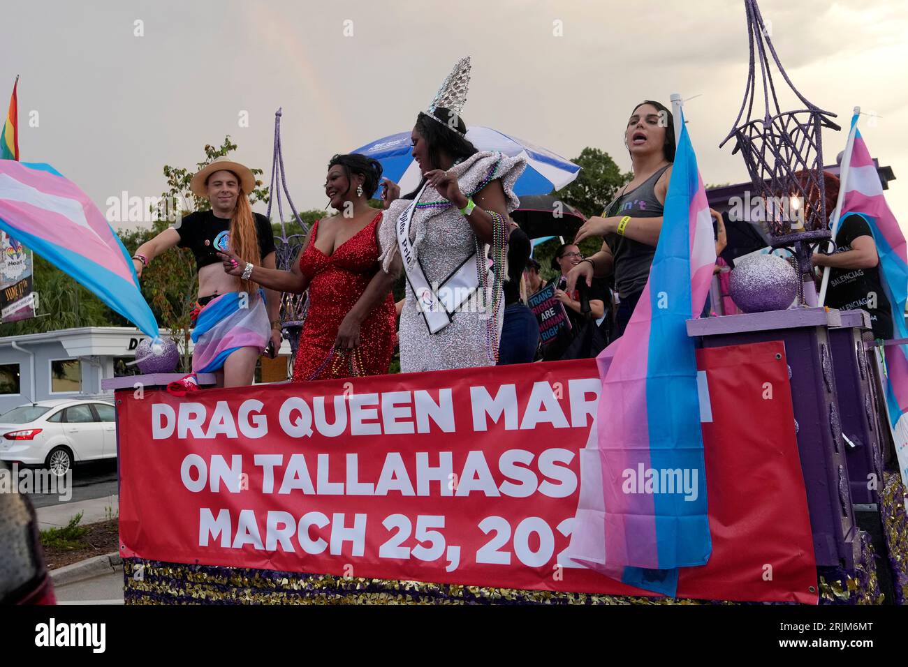 Tiffany Arieagus, a transgender woman, second from left, rides on a ...