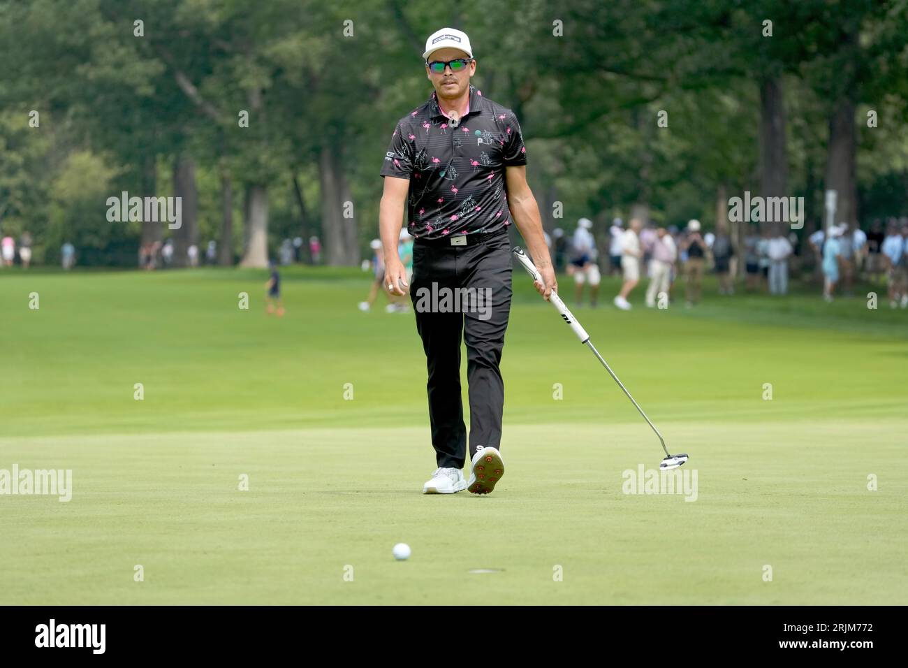Rickey Fowler walks to his ball on the 15th green during the second ...