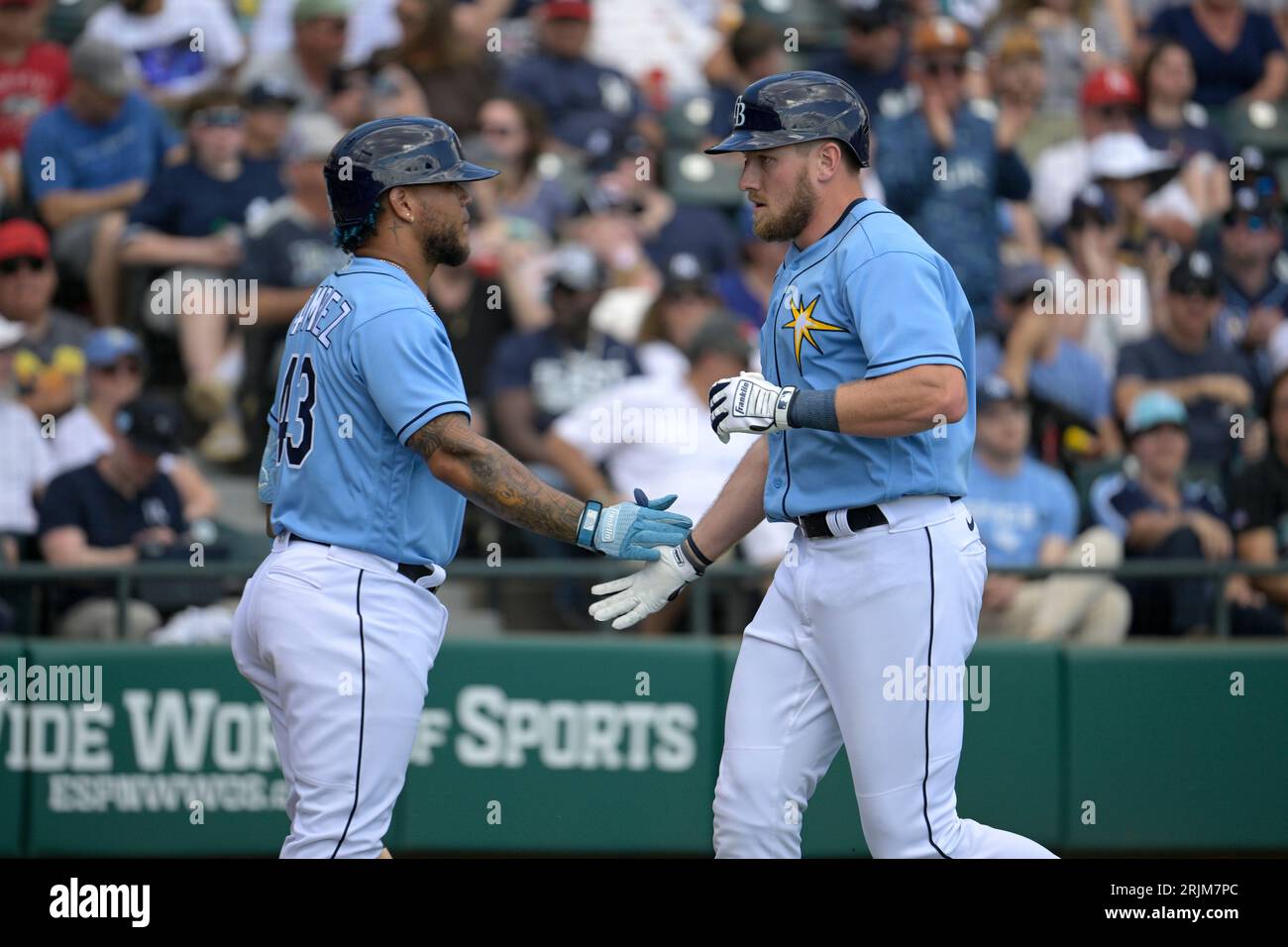 Tampa Bay Rays' Luke Raley, right, is congratulated by Harold Ramirez ...