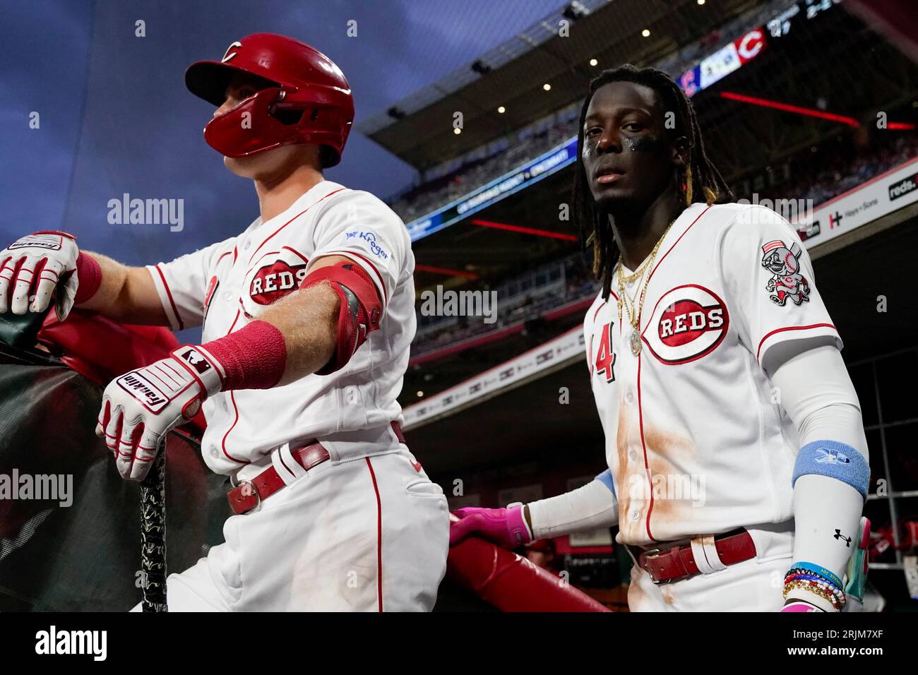 Cincinnati Reds' Matt McLain, left, and Elly De La Cruz (44) stand in ...