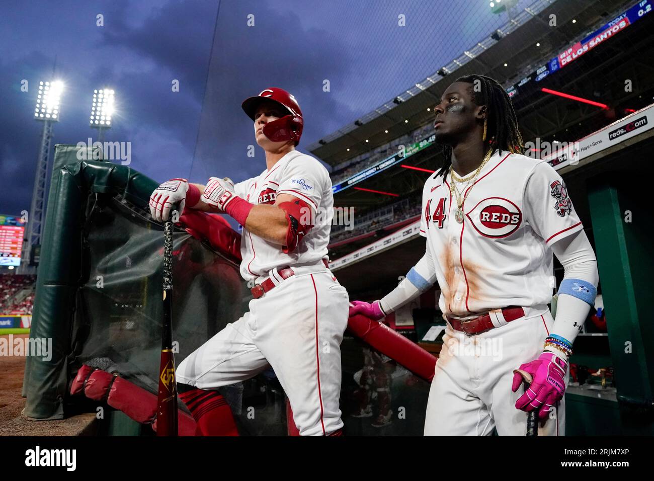 Cincinnati Reds' Matt McLain, left, and Elly De La Cruz (44) stand in ...