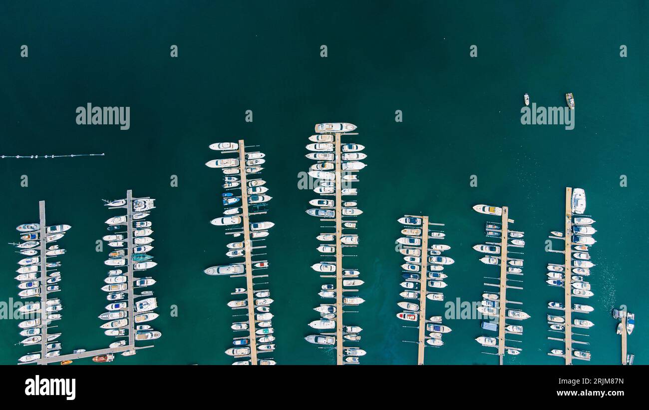 This stock photo features a stunning view of the harbor in Luanda ...
