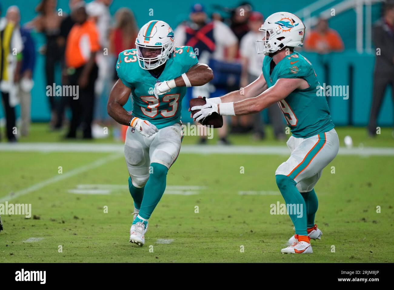 Miami Dolphins quarterback Skylar Thompson (19) fakes a handoff to ...