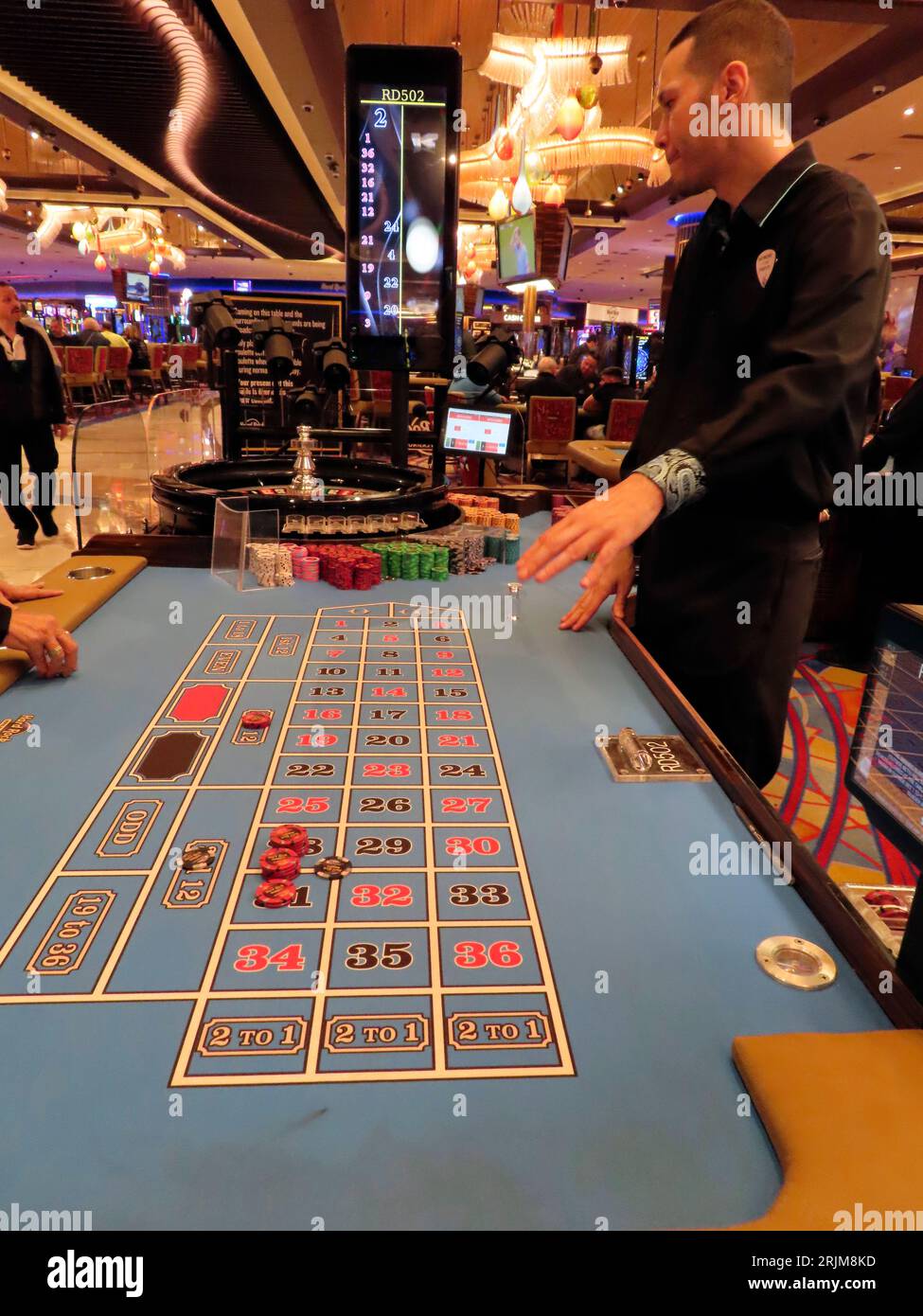 A dealer conducts a game of roulette at the Hard Rock casino in ...