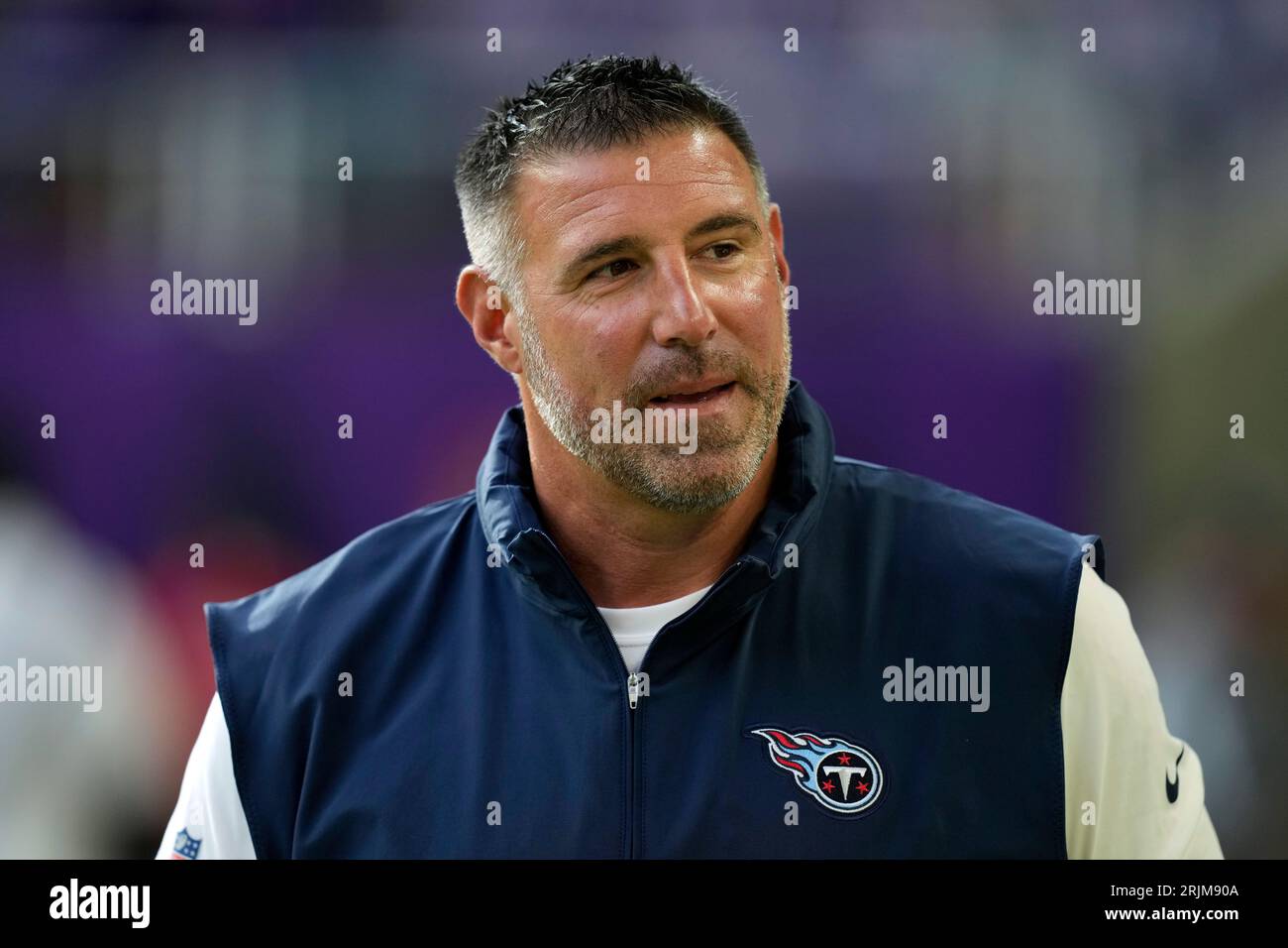 Tennessee Titans head coach Mike Vrabel walks on the field before an ...