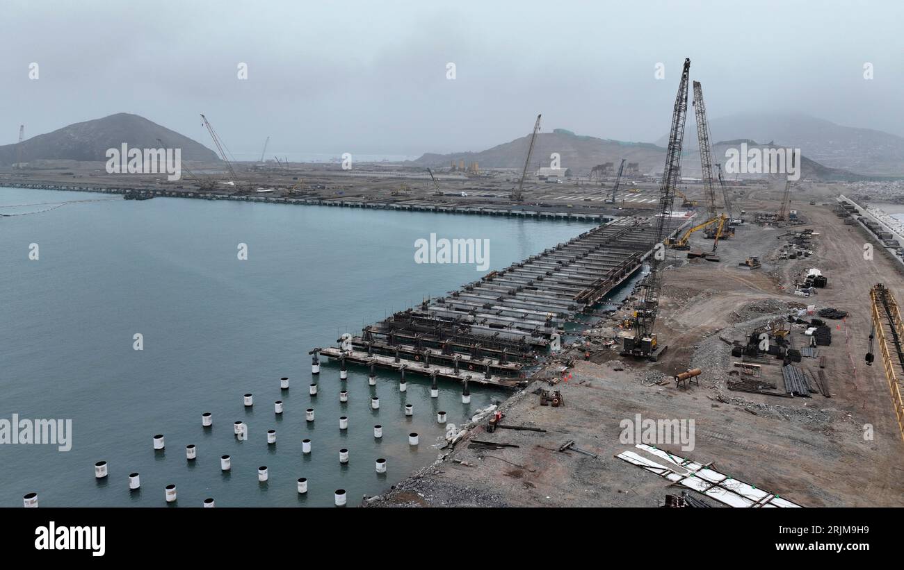 Cranes work in the construction of the Chancay Multipurpose Port ...