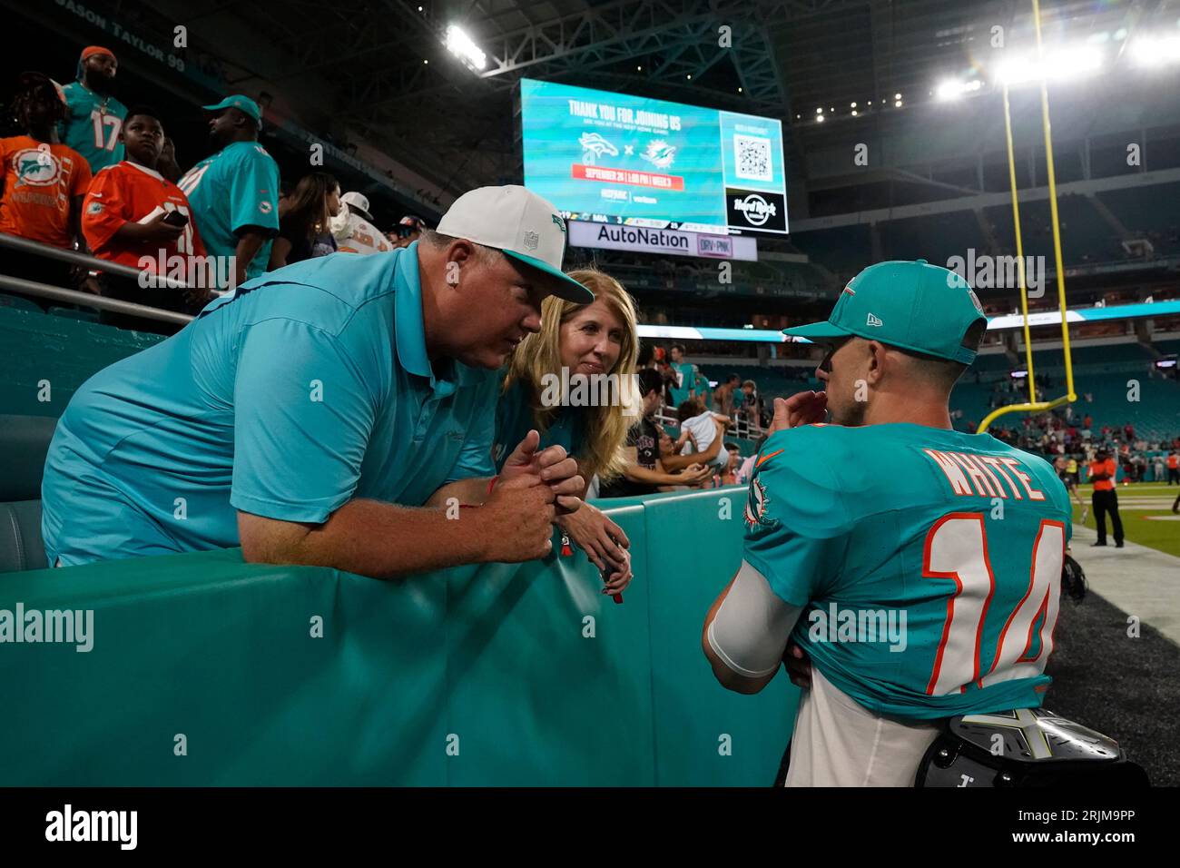 Miami Dolphins quarterback Mike White (14) talks with people in the ...