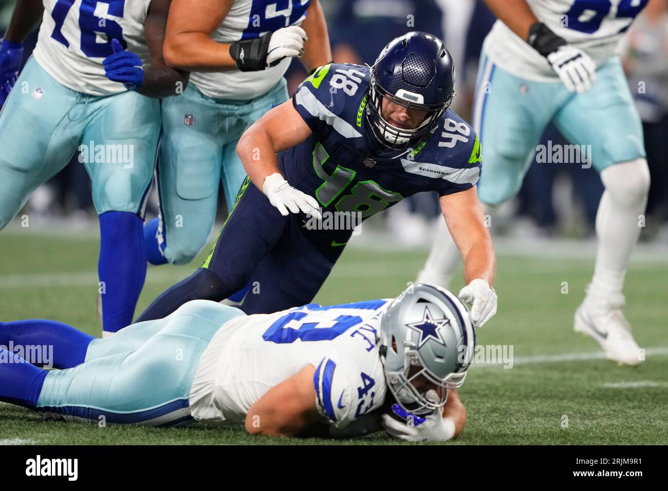 Seattle Seahawks linebacker Ben Burr-Kirven (48) jumps to tackle Dallas ...