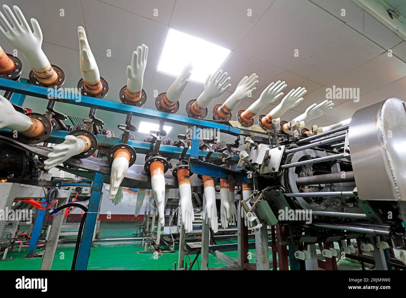 Production line of medical protective gloves, China Stock Photo - Alamy