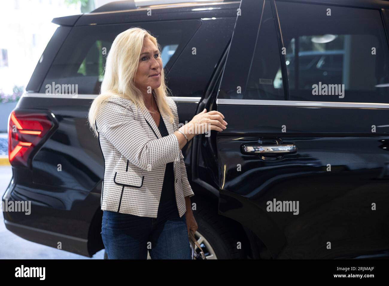 Rep. Marjorie Taylor Greene (R-Ga.) gets out of a vehicle at a hotel ...