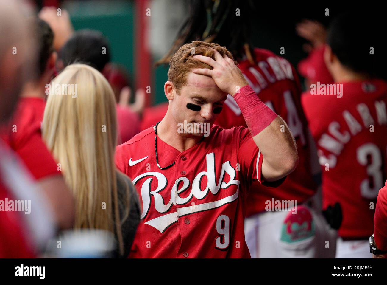 Cincinnati Reds shortstop Matt McLain (9) walks through the dugout ...