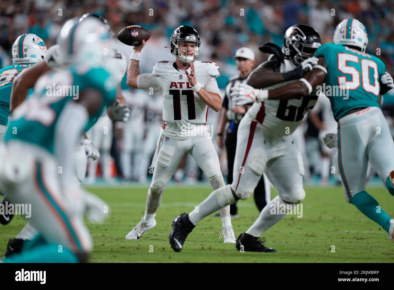 Atlanta Falcons quarterback Logan Woodside looks for an open teammate ...