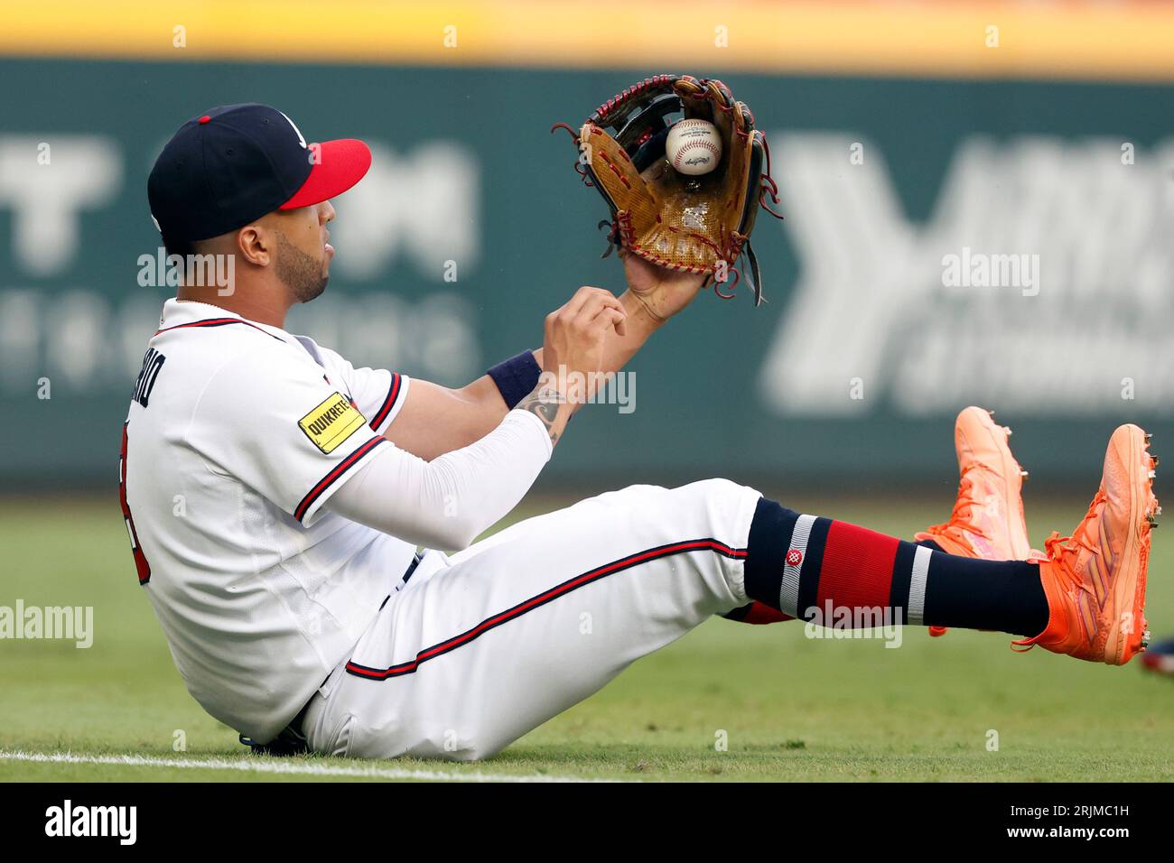 Atlanta Braves left fielder Eddie Rosario catches a fly ball for the ...
