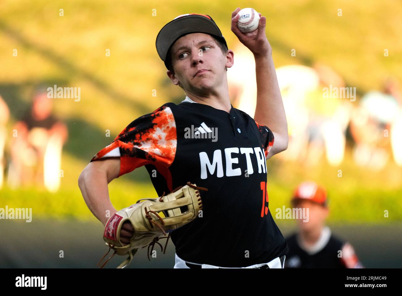 Smithfield, R.I.'s Connor Curtis delivers during the first inning of a ...