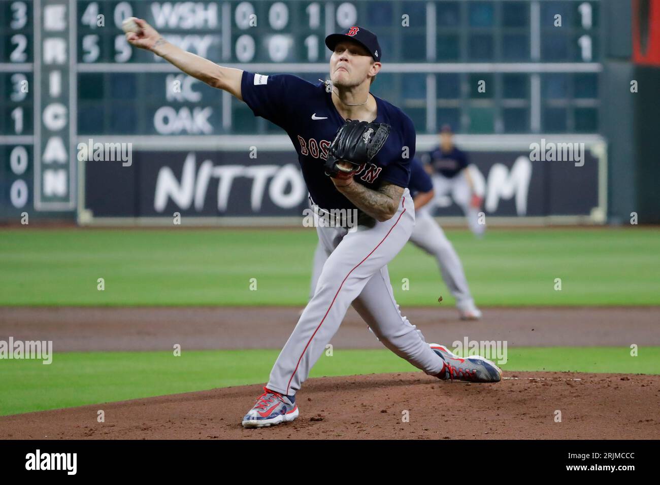 Boston Red Sox starting pitcher Tanner Houck throws against the Houston ...