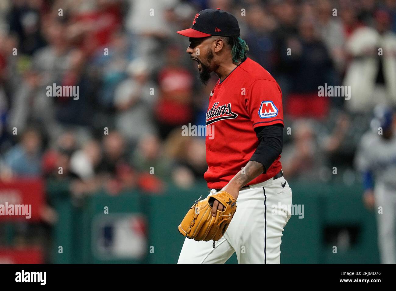 Cleveland Guardians relief pitcher Emmanuel Clase shouts as the ...