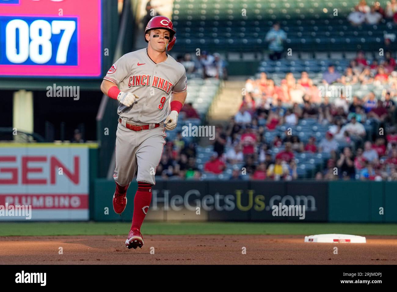 Cincinnati Reds' Matt McLain heads to third after hitting a solo home ...
