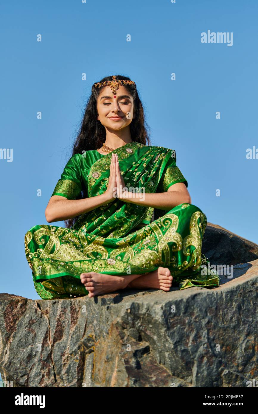 Beautiful indian woman meditating in hi-res stock photography and ...