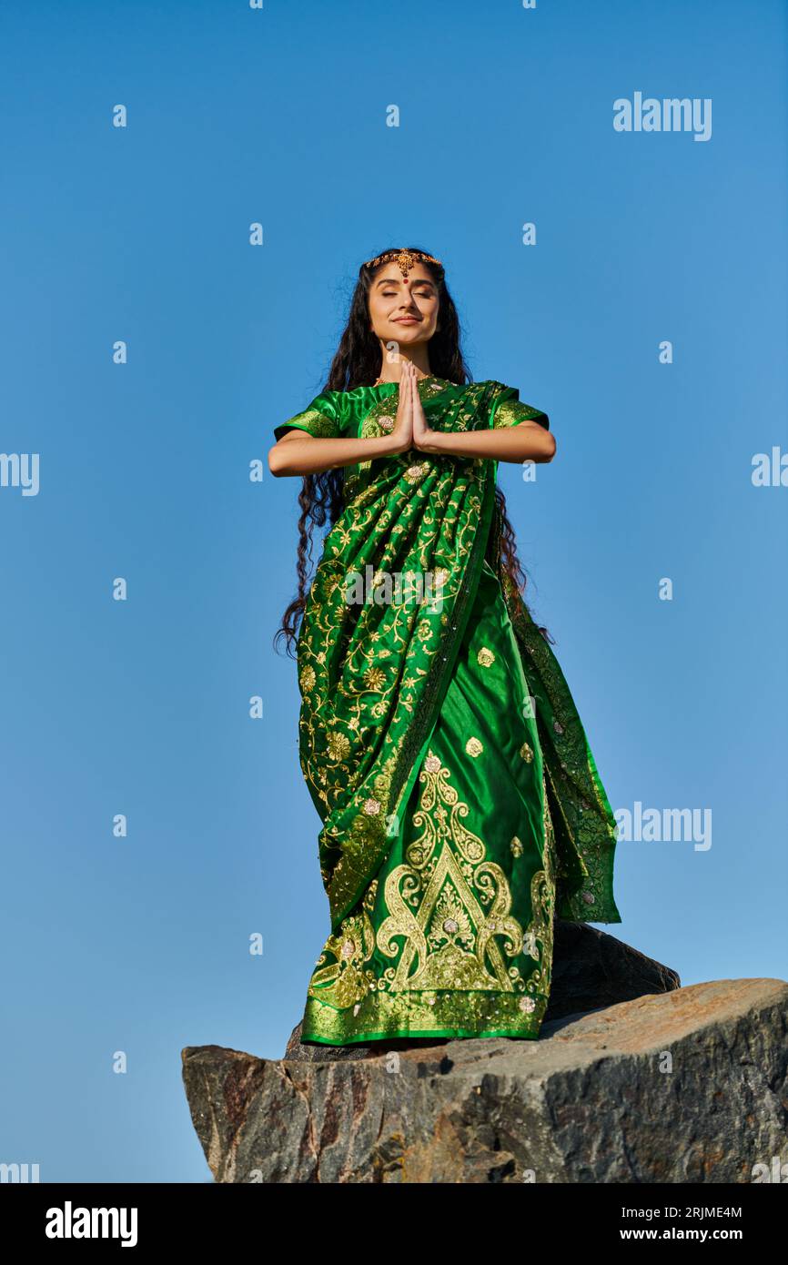 Beautiful indian woman meditating in hi-res stock photography and ...