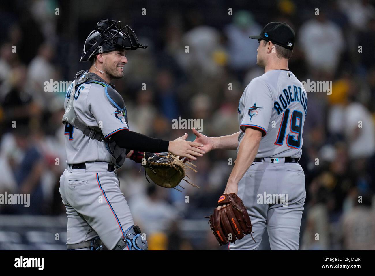 Miami Marlins catcher Nick Fortes, left, celebrates with relief pitcher ...