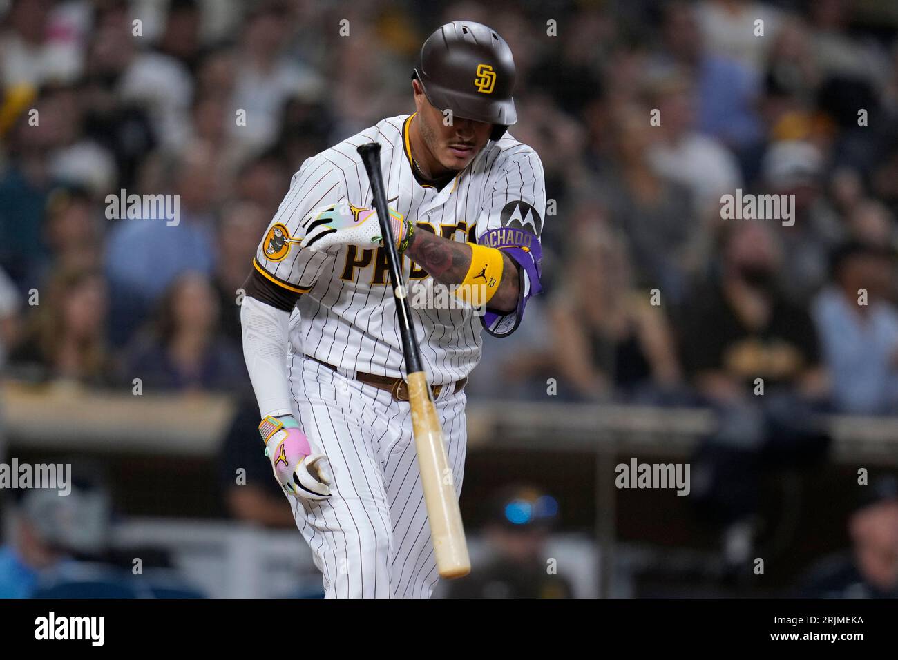 San Diego Padres' Manny Machado tosses his bat as he flies out during ...