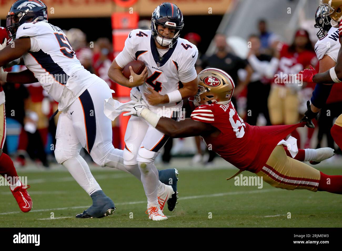 San Francisco 49ers defensive tackle Marlon Davidson (62) sacks Denver Broncos quarterback ...