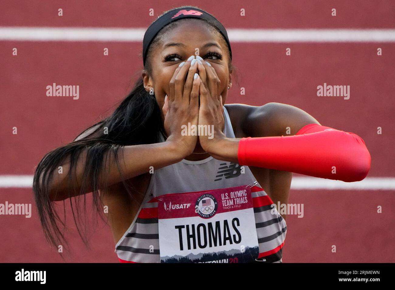 FILE - Gabby Thomas celebrates after winning the final in the women's ...
