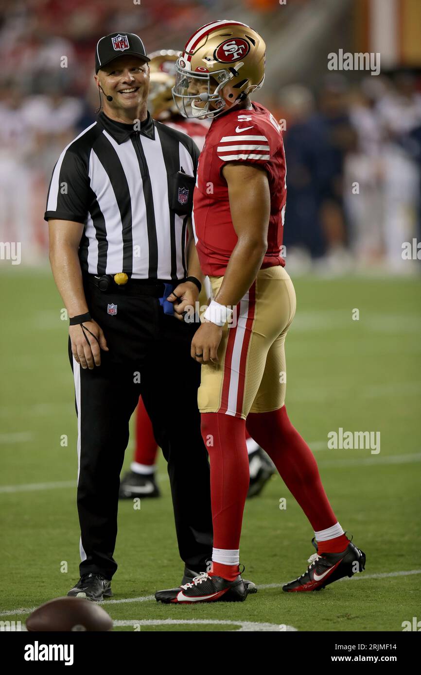 San Francisco 49ers quarterback Trey Lance (5) and Umpire Mike Morton ...