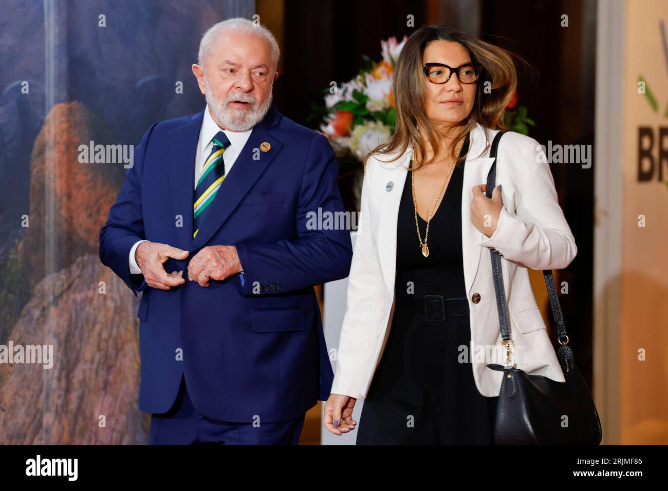 Brazilian President Luiz Inacio Lula da Silva accompanied by first lady ...