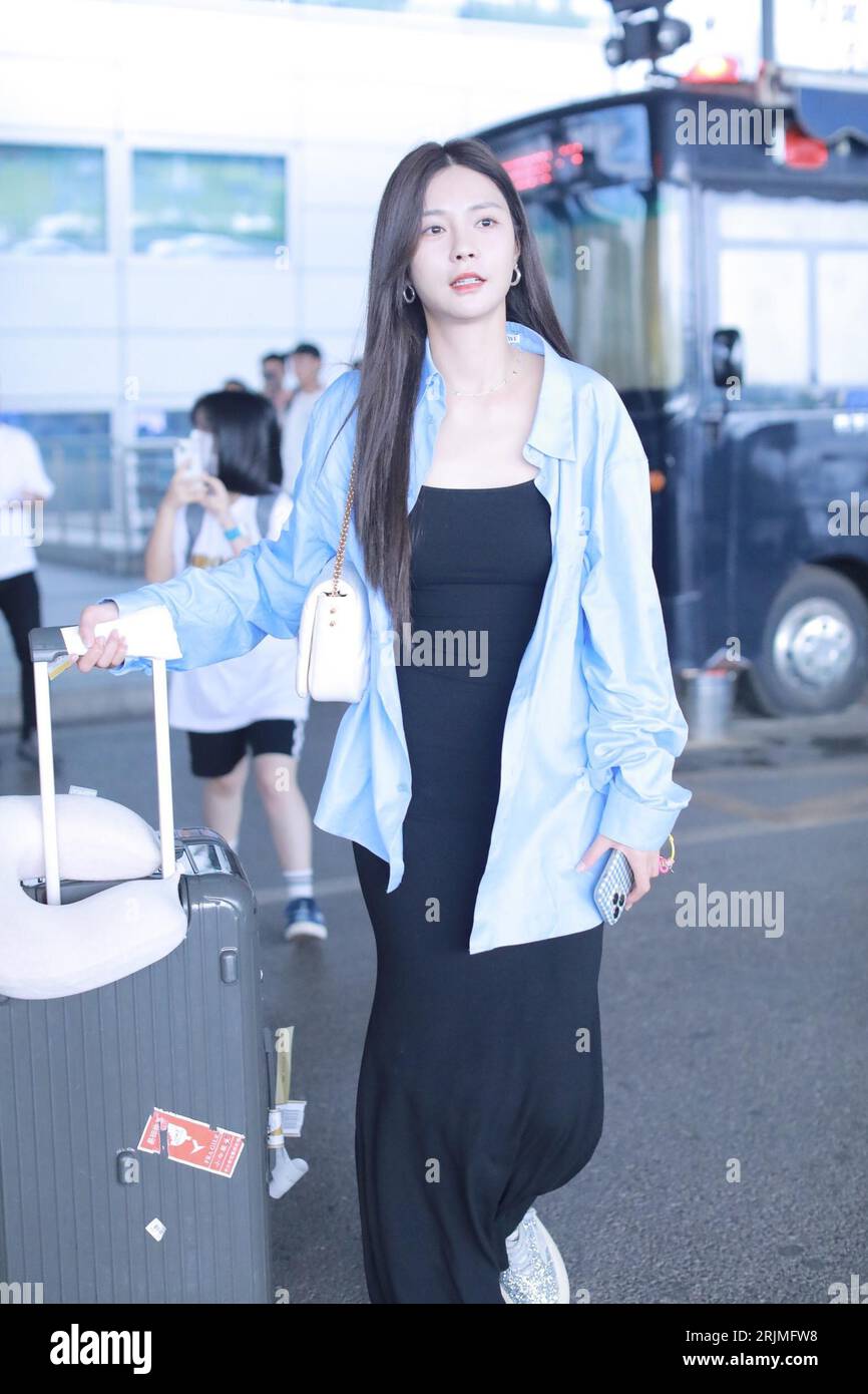 Chinese actress, host, and model Shen Mengchen appears at the airport ...