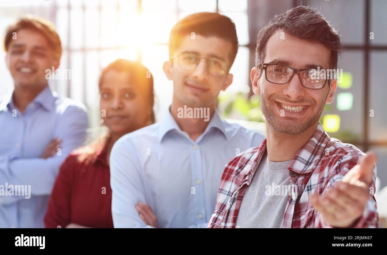 Welcome on board. Portrait of positive confident millennial male hr ...