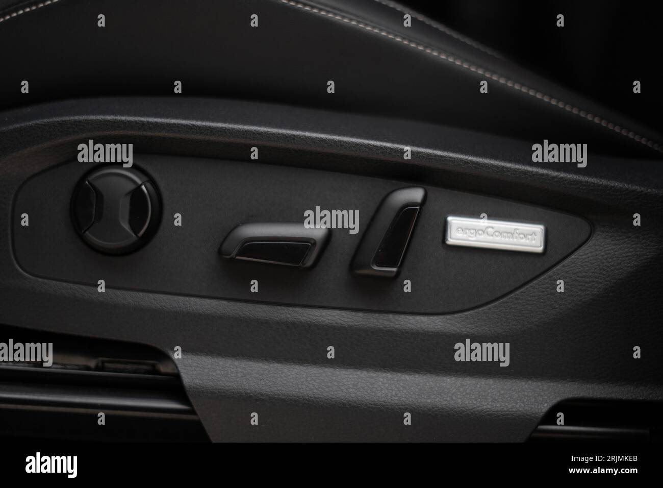 Interior of a modern automobile, featuring a dashboard with a variety ...