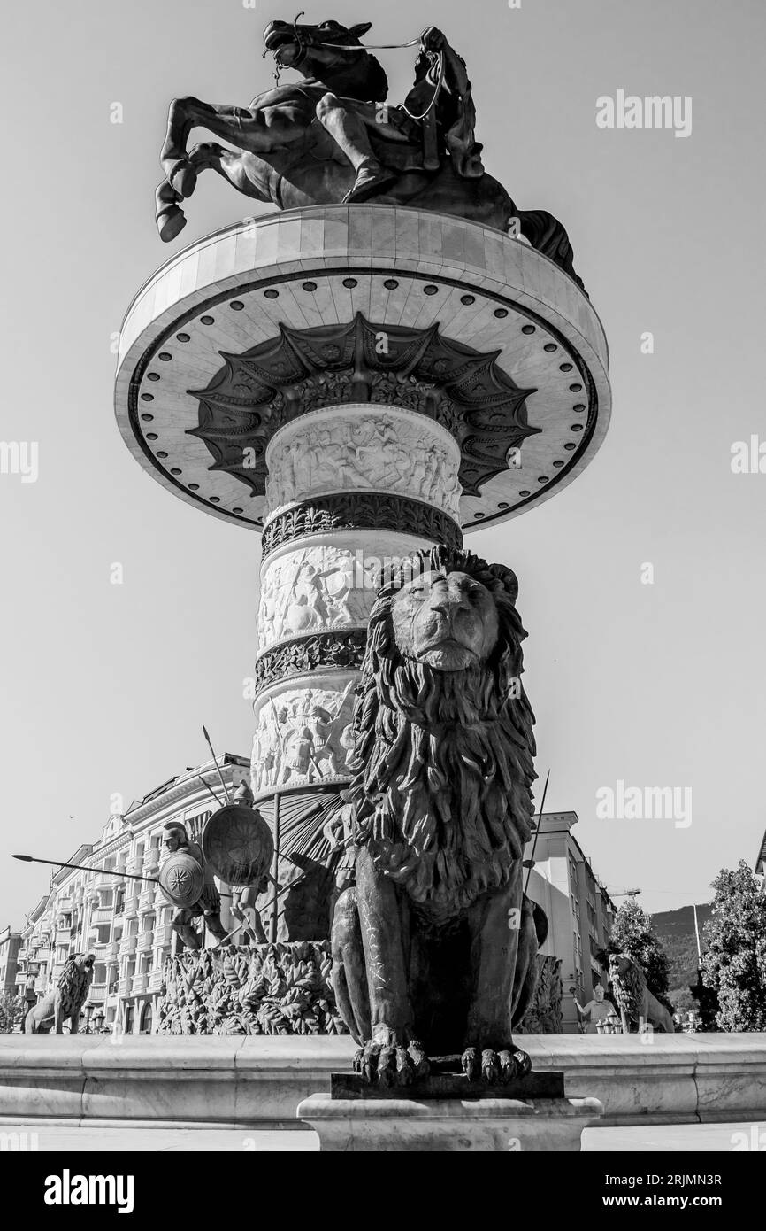 Statue of a lion forming part of the fountain around the monument of ...