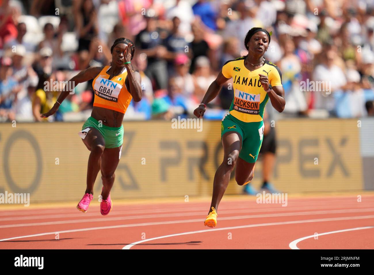 Shericka Jackson, of Jamaica, right, and Jessika Gbai, of The Ivory ...
