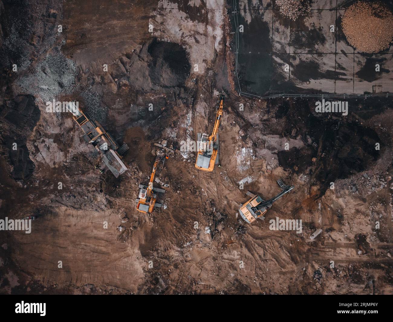 An aerial view of two diggers actively engaged in the industrial ...