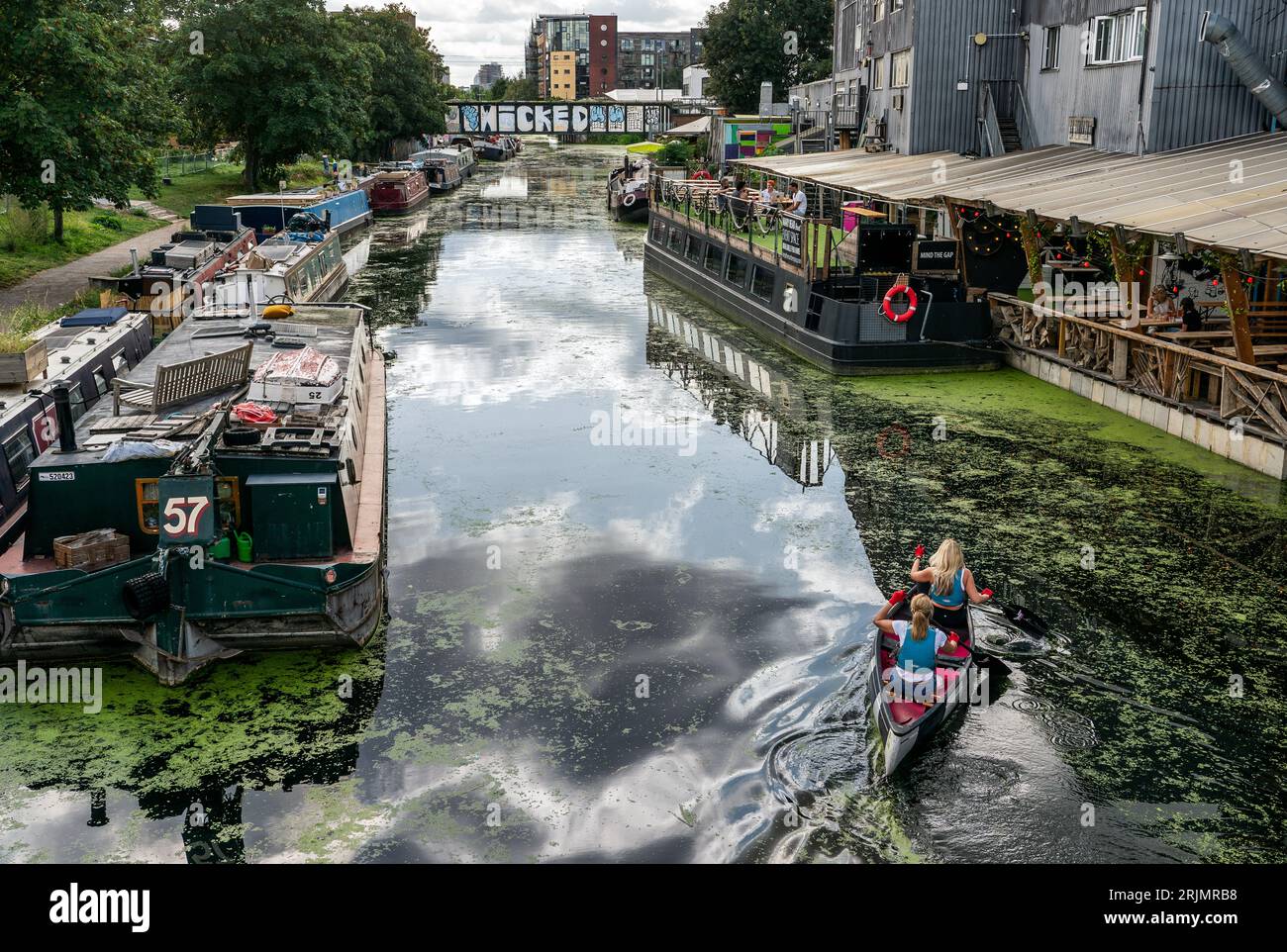 People enjoying the hot weather on the River Lea in Hackney, London ...