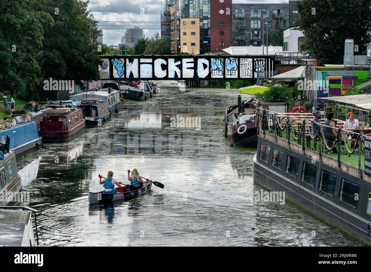 People enjoying the hot weather on the River Lea in Hackney, London ...