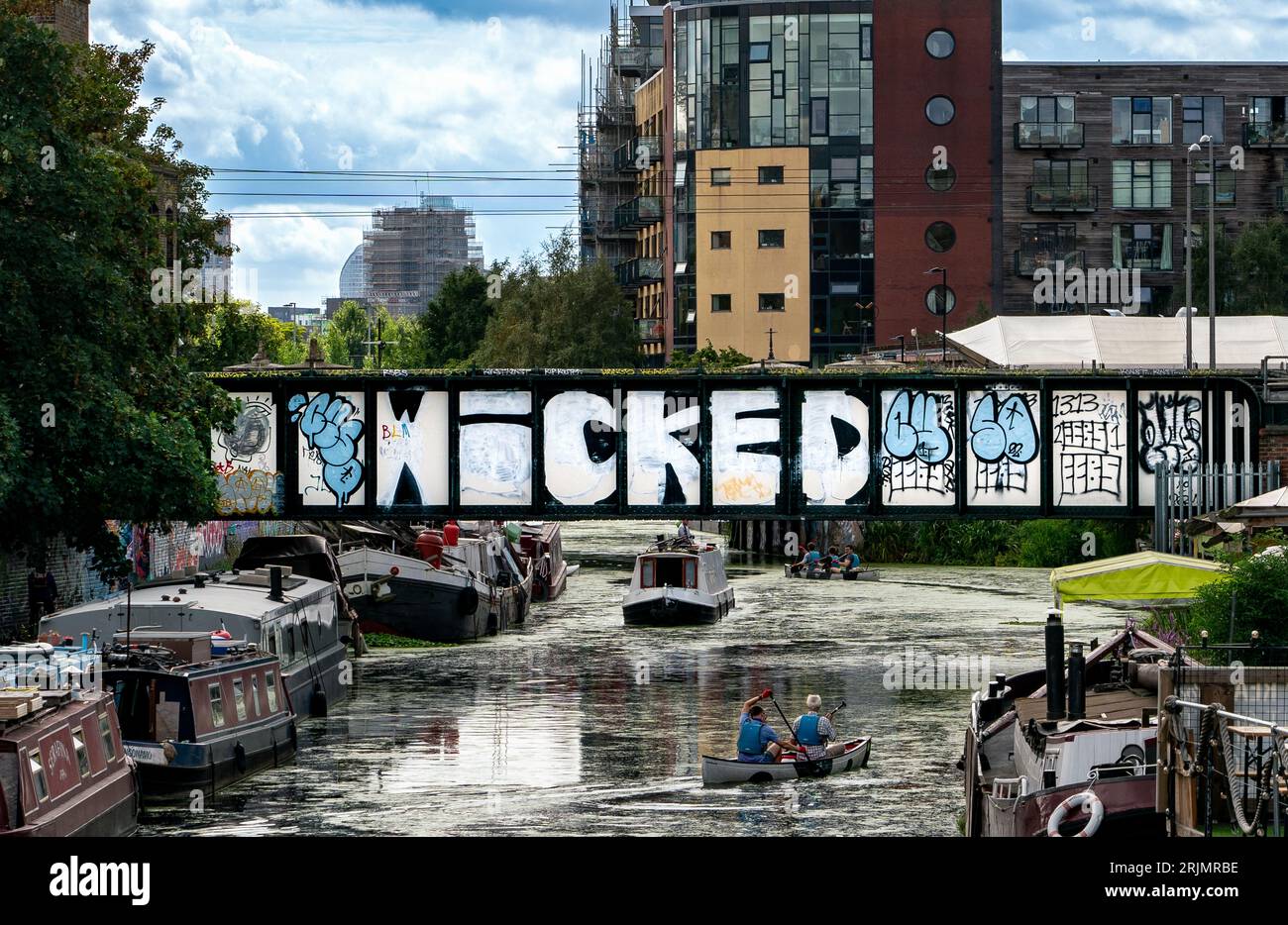 People enjoying the hot weather on the River Lea in Hackney, London ...