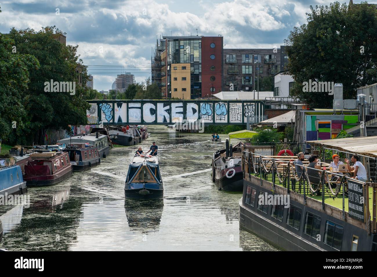 People enjoying the hot weather on the River Lea in Hackney, London ...