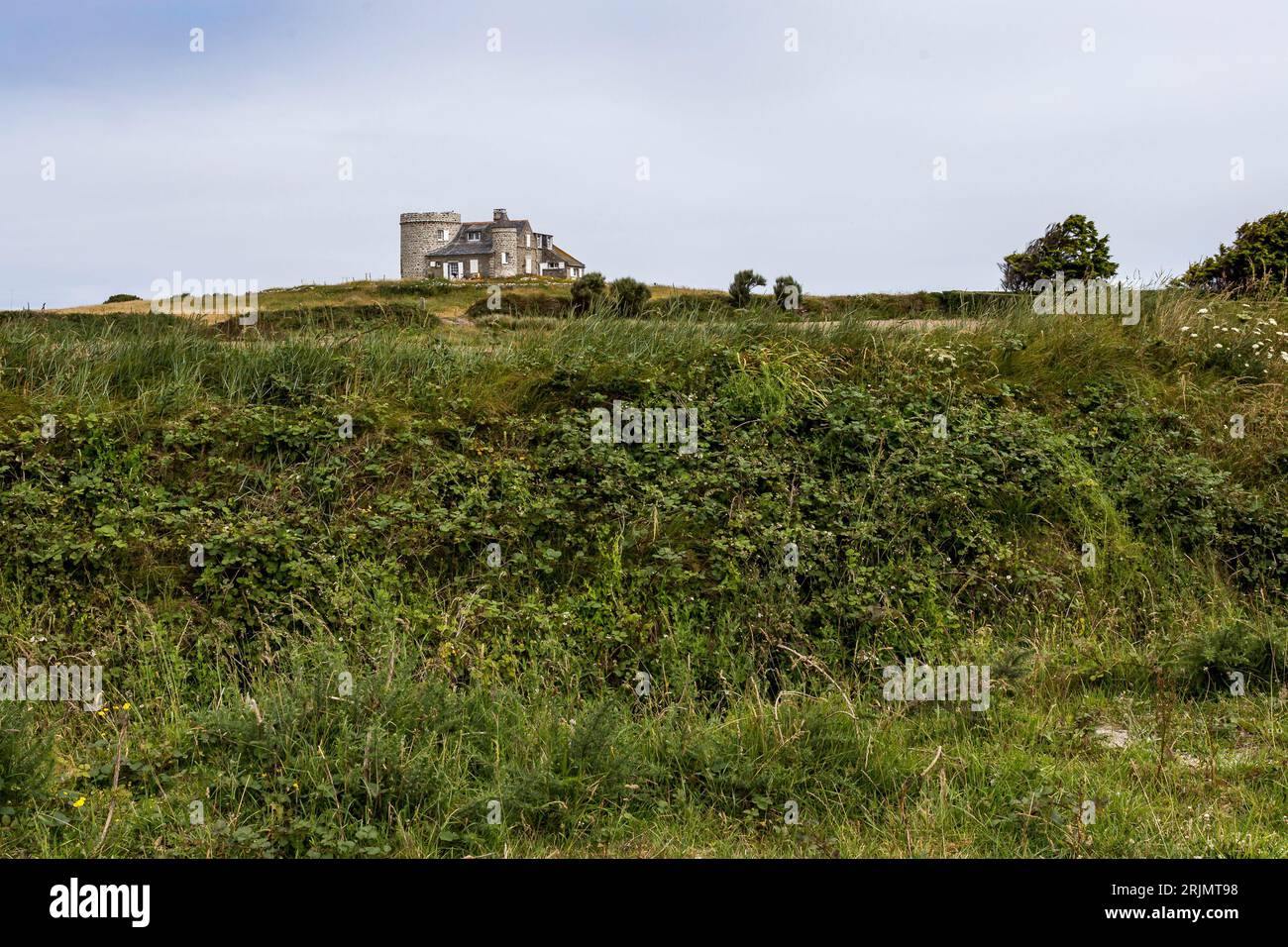 A historical castle surrounded by greenery in Bretagne, France Stock ...