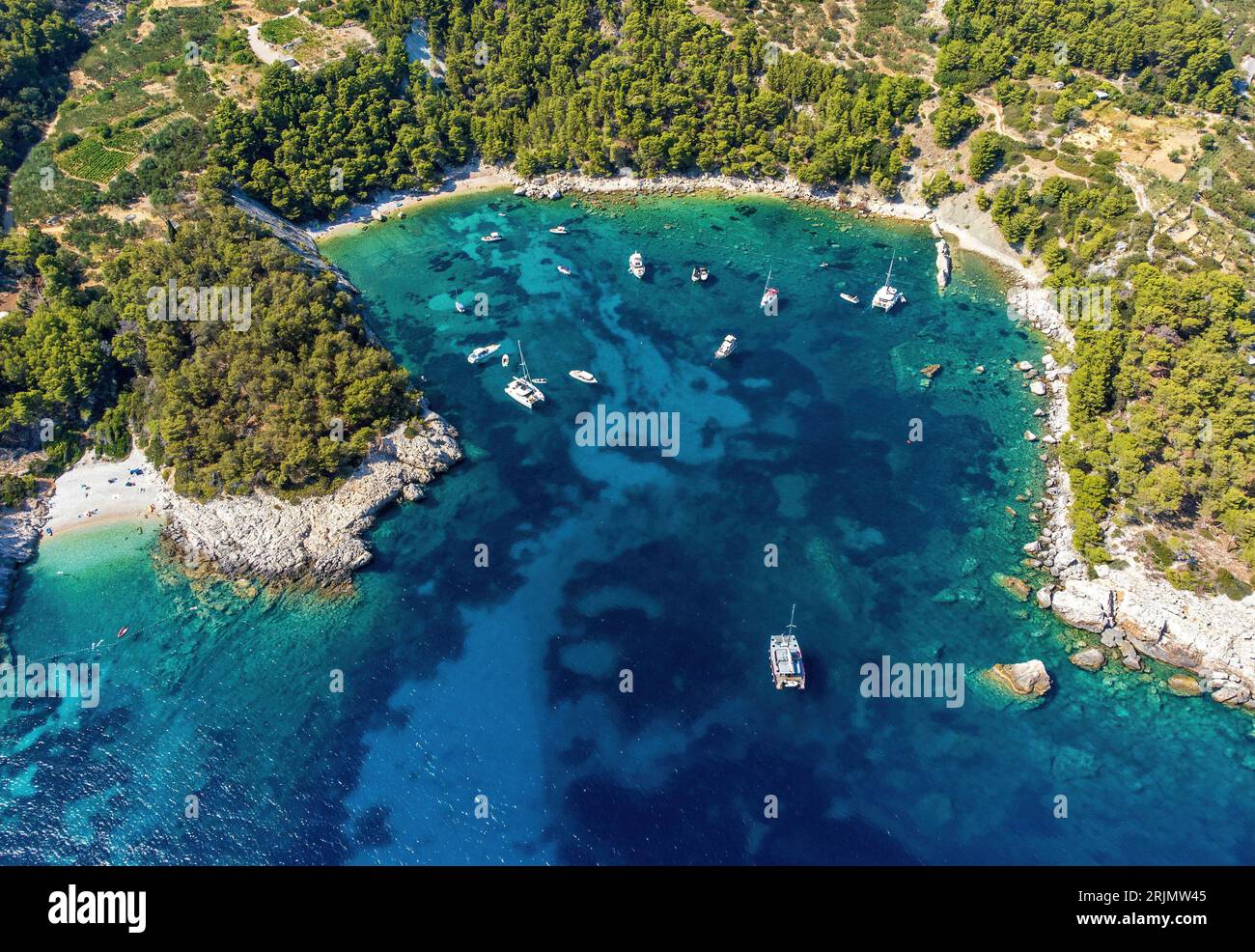 Amazing aerial photo of boats moored at beautiful Velo Borce beach on ...