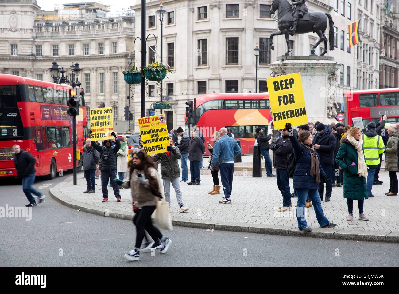 Participants gather with placards during a protest against the ...