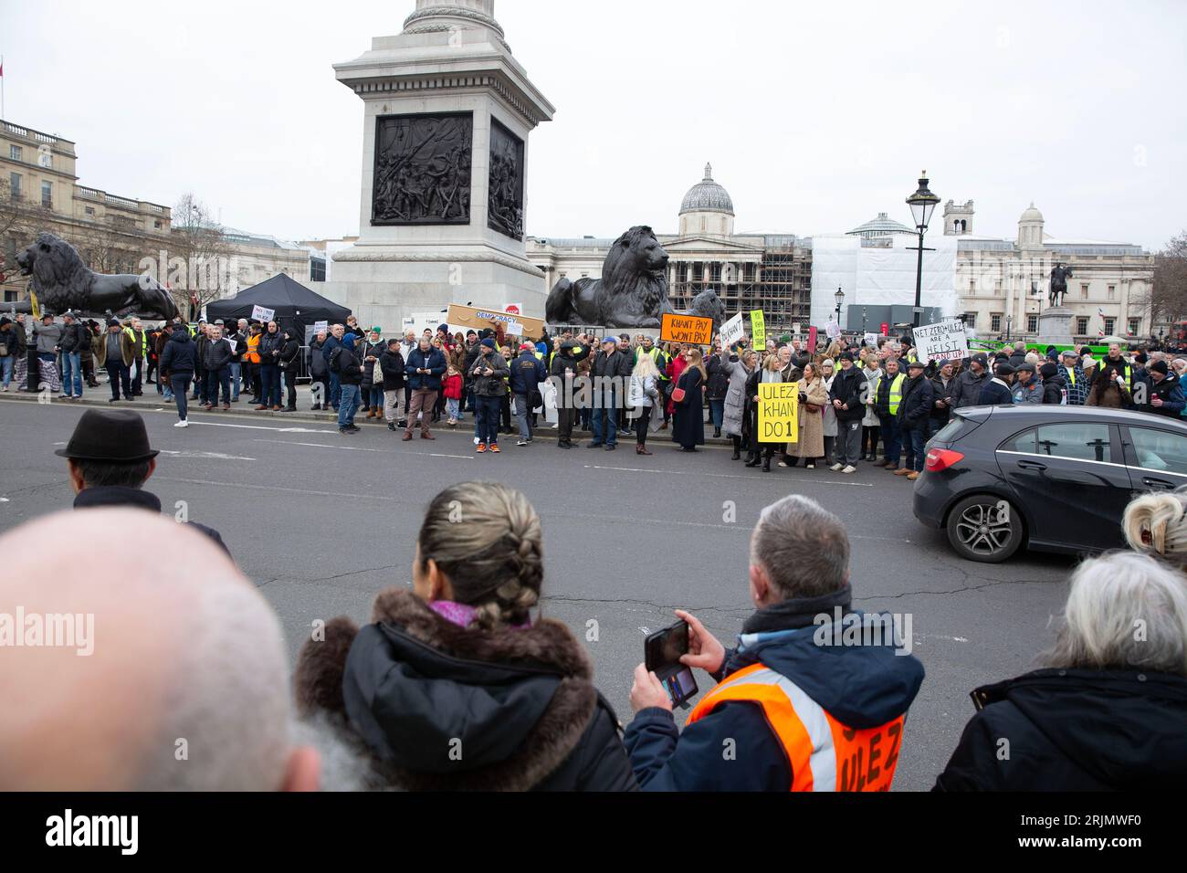 Participants gather with placards during a protest against the ...