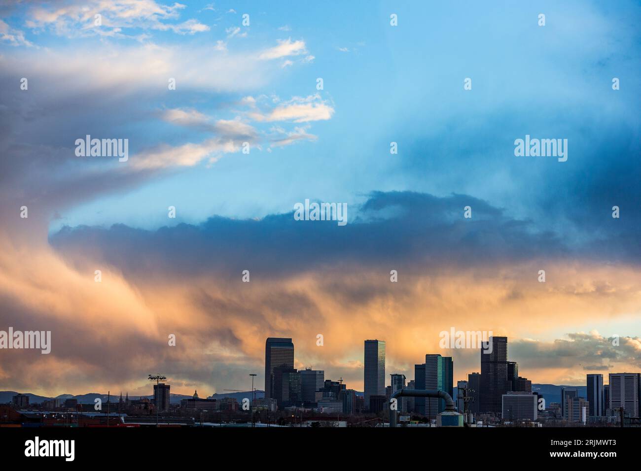 Dramatic cityscape of Denver skyline with sunset cloud formations Stock ...