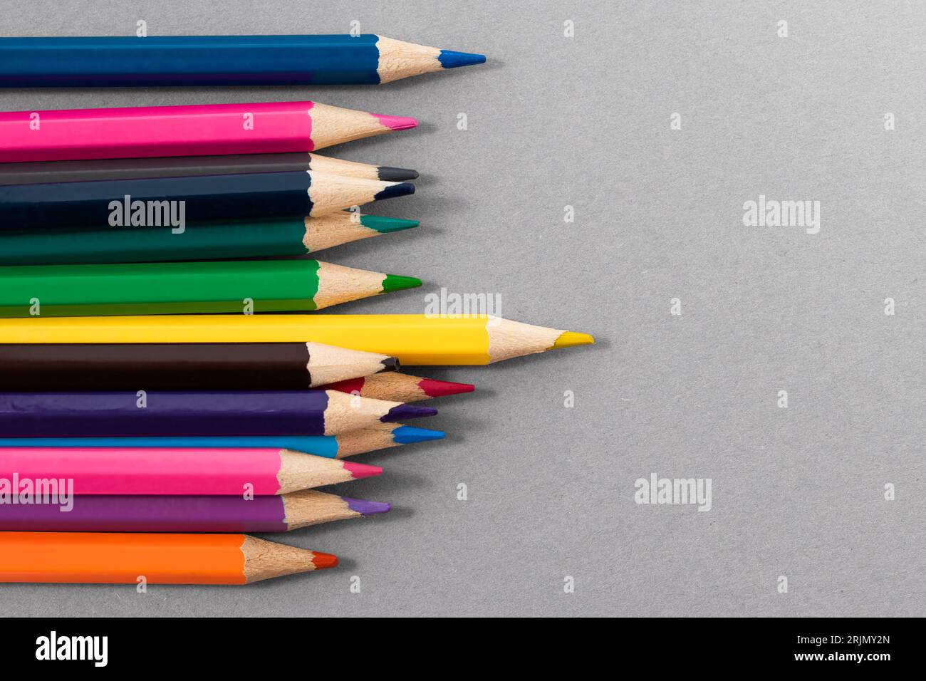 Colored pencils on gray paper with space to write to the right. Top ...