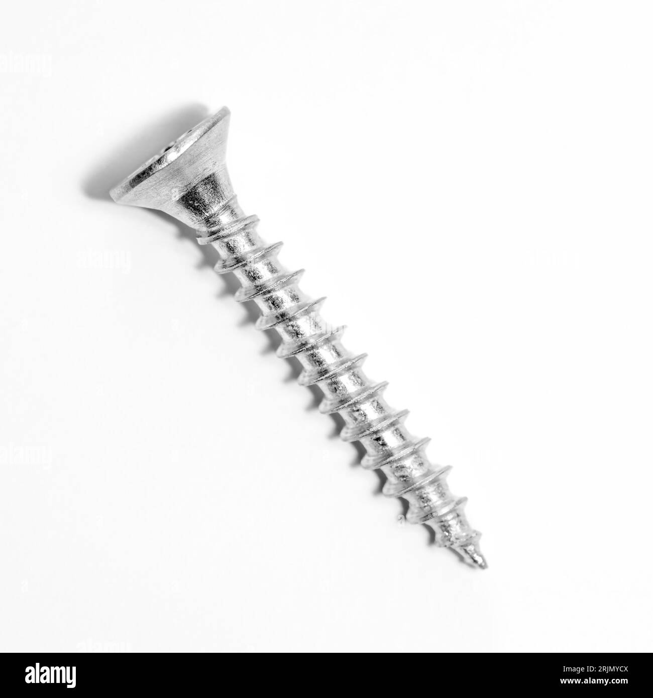 Closeup of metal screw with shadow on white background Stock Photo - Alamy