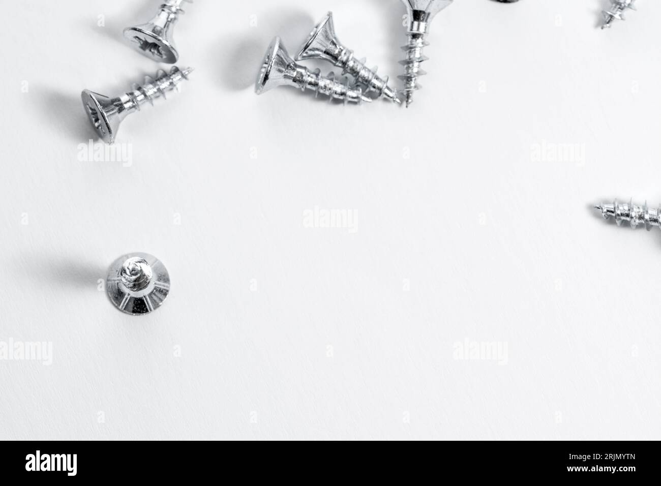 Large pile shiny metal screws hi-res stock photography and images - Alamy