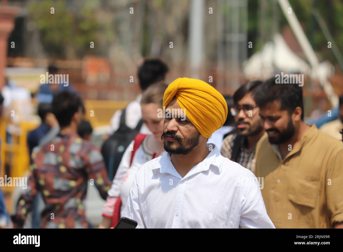 Old man traditionally dressed at the streets of New Delhi, India Stock ...